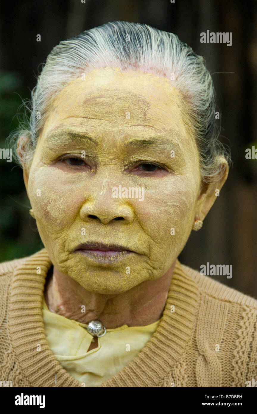 Mon woman with tanaka face paint in Sangkhlaburi Thailand Stock Photo ...