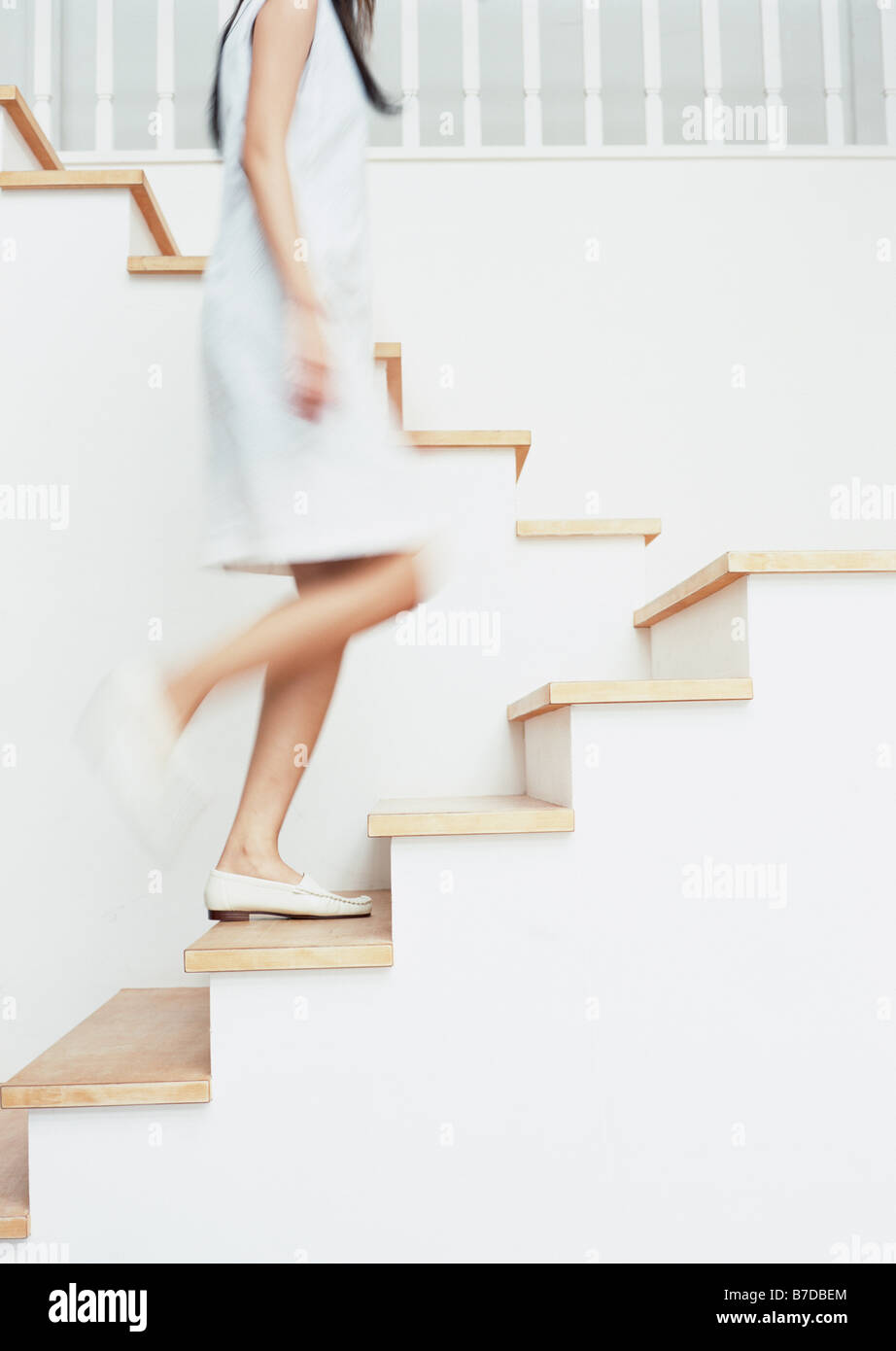 Up stairs woman skirt hi-res stock photography and images - Alamy