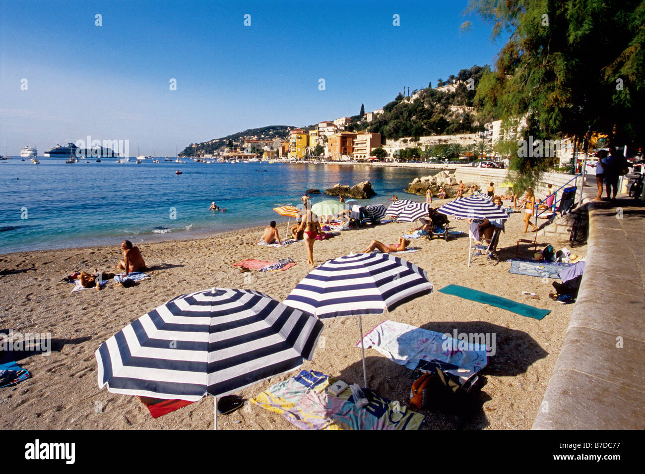 The beach of "Les Marinnieres" of the coastal village of Villefranche ...
