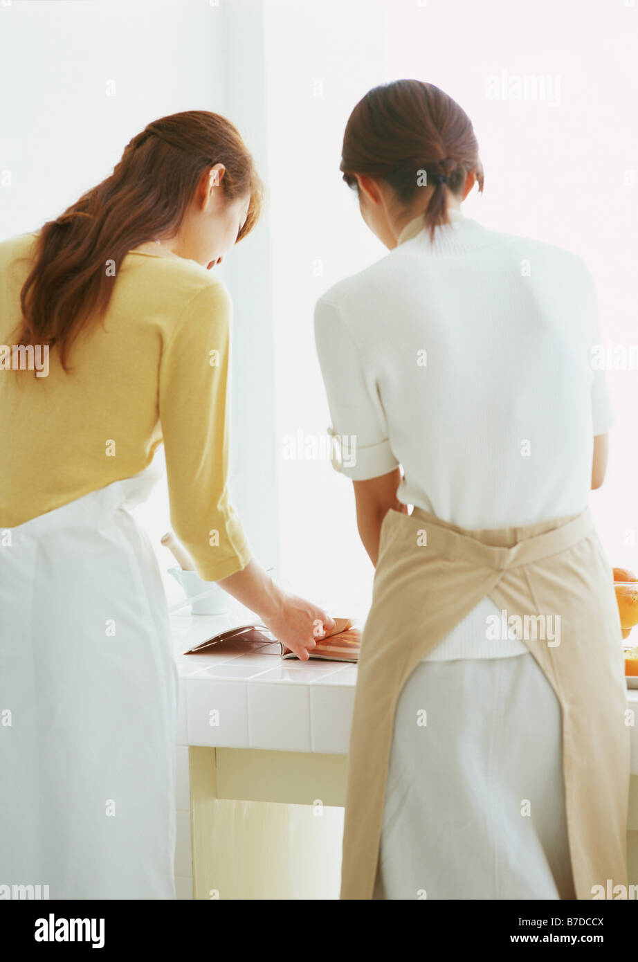 Women in kitchen Stock Photo - Alamy