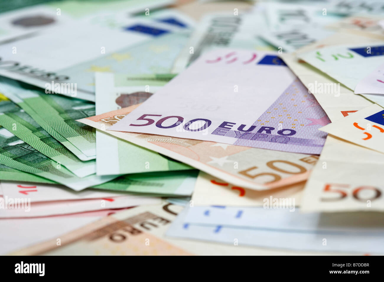Lots of euro notes on table hi-res stock photography and images - Alamy