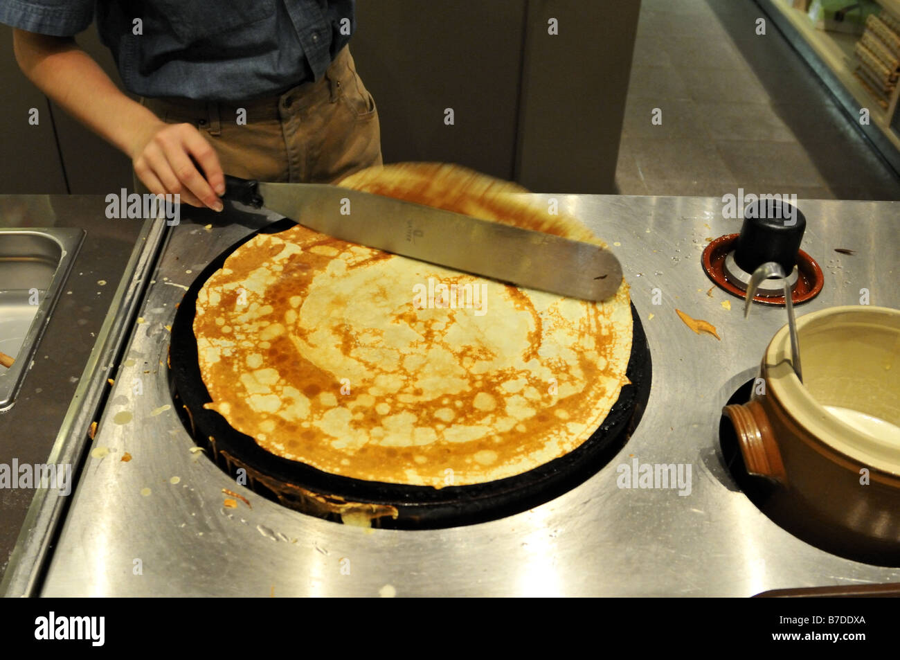 Making French crepe sequence 4 of 4 Stock Photo - Alamy
