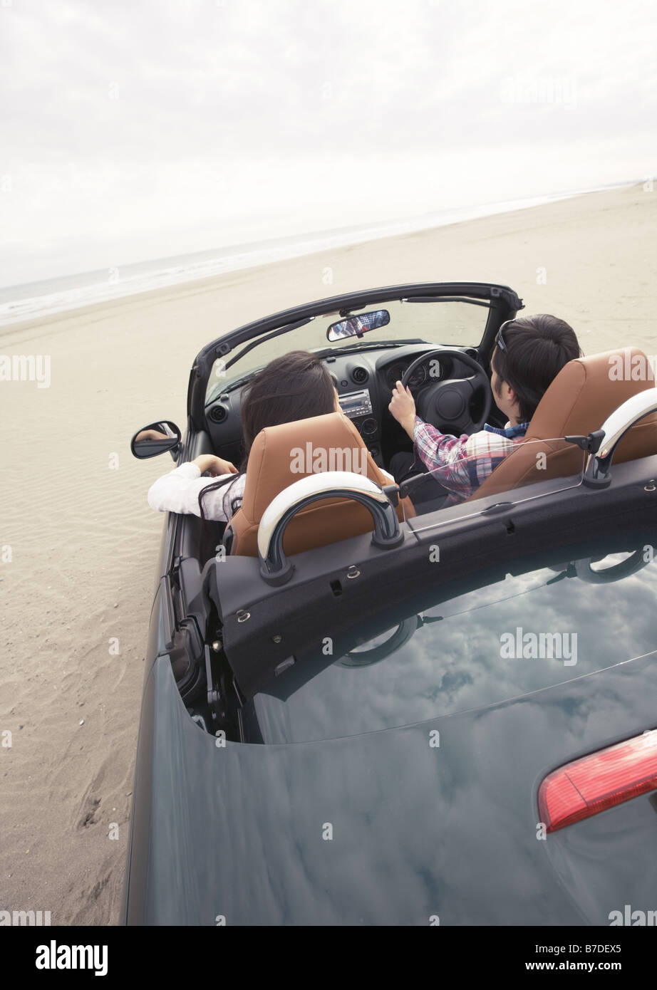 Couple having a drive Stock Photo - Alamy
