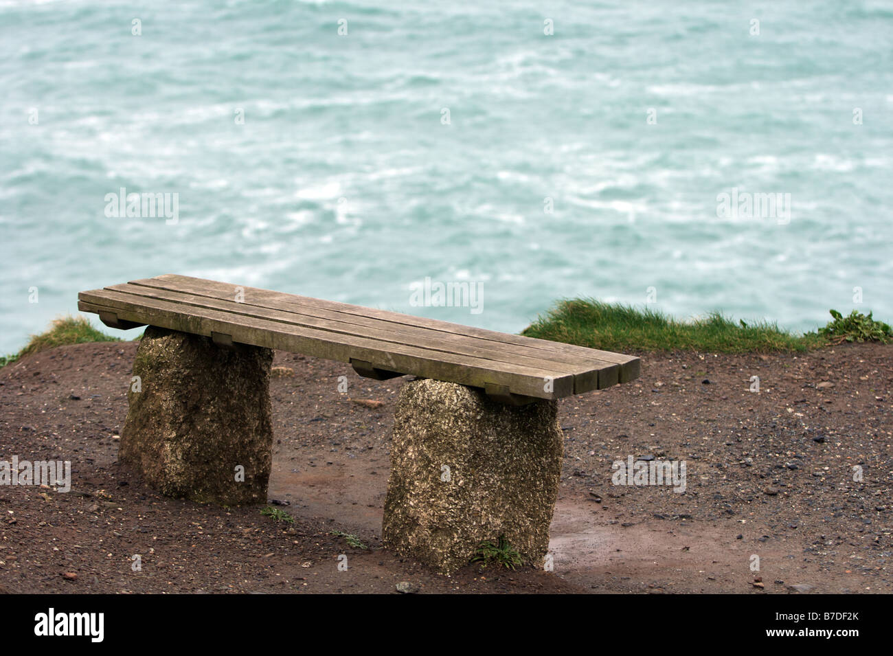 Bench Overlooking The Sea Stock Photo - Alamy