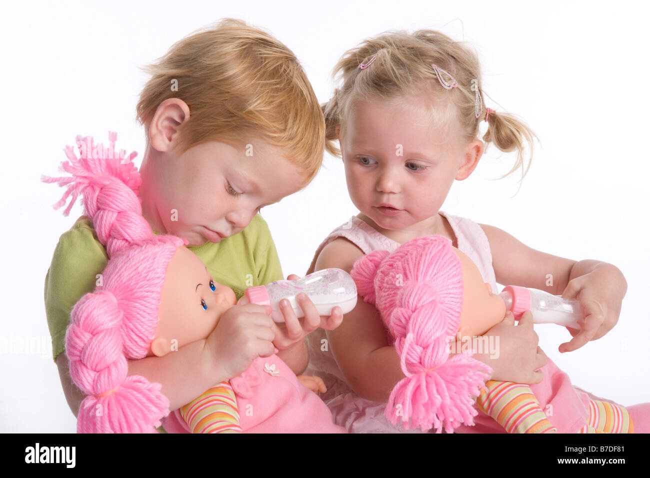 Feed dolls hi-res stock photography and images - Alamy