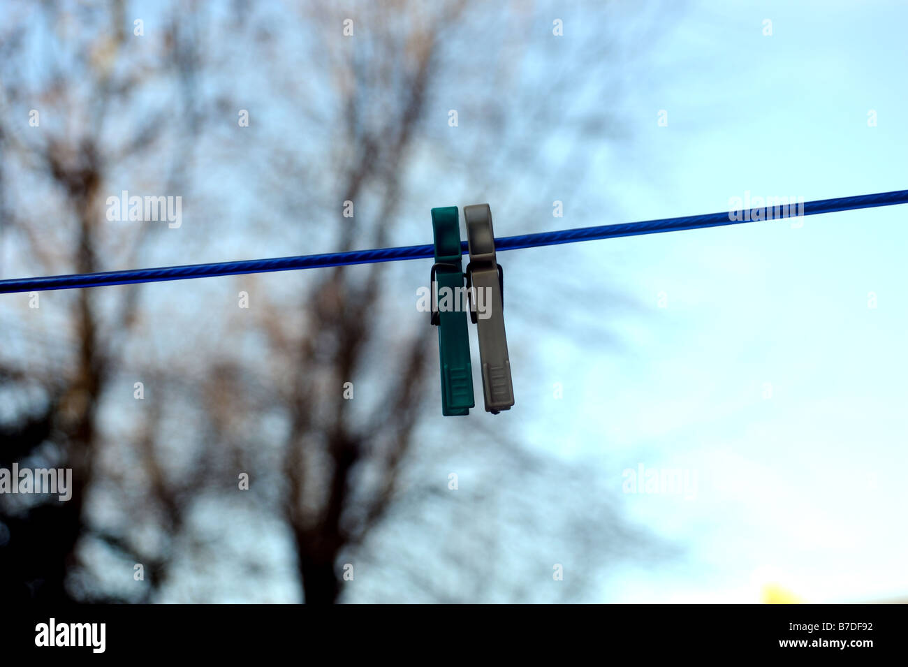 A pair of clothes pegs Stock Photo - Alamy