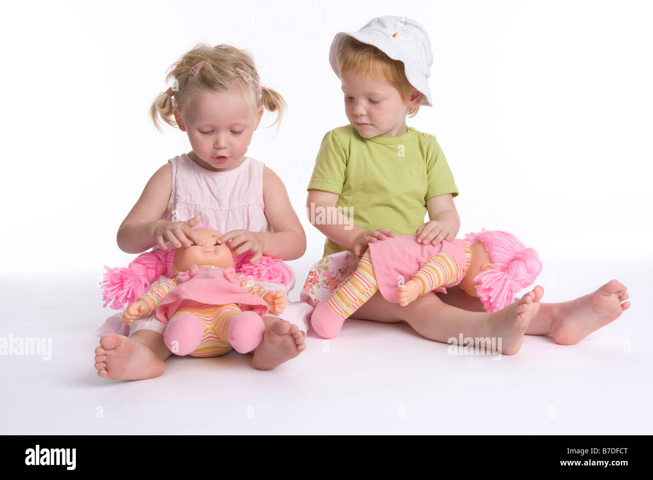 Girl play dolls hi-res stock photography and images - Alamy