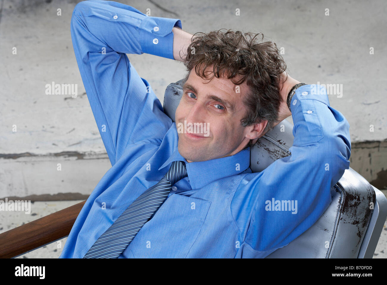 Folding arms behind head hi-res stock photography and images - Alamy