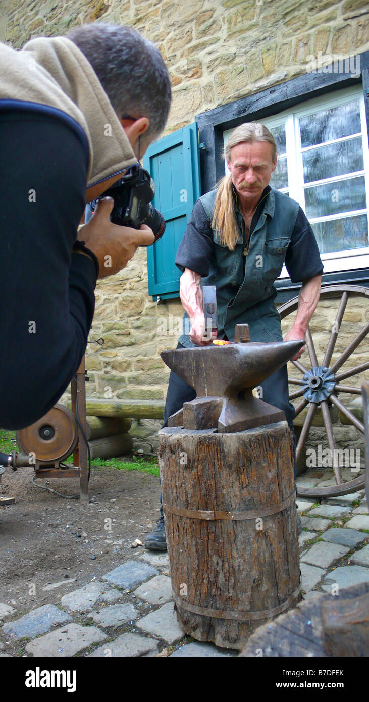traditional handcraft, photograph taking pictures of smith at work ...