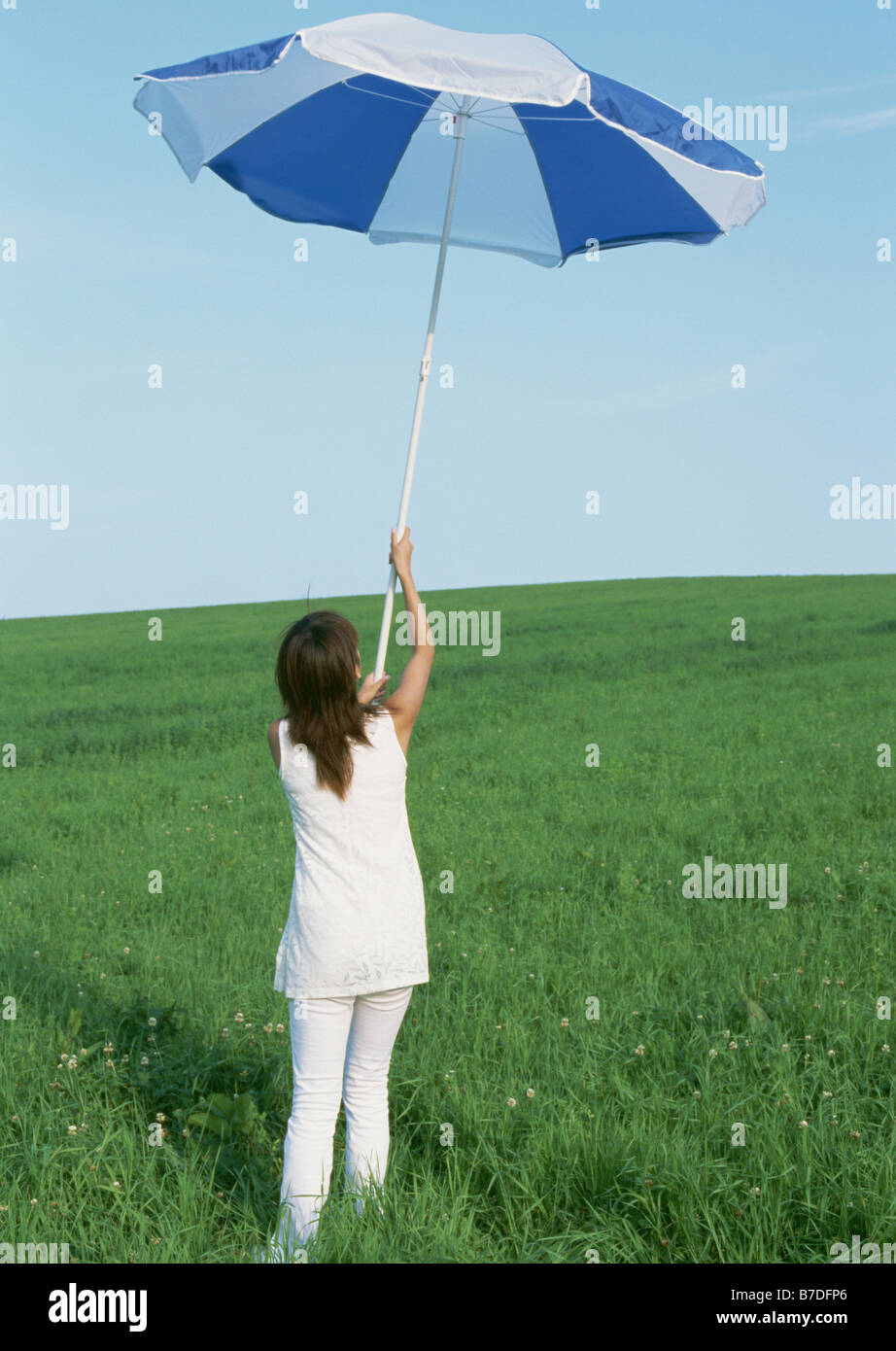 Young japanese woman parasol in hi-res stock photography and images - Alamy