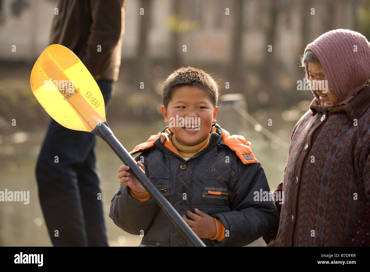 old chinese woman with child Stock Photo - Alamy