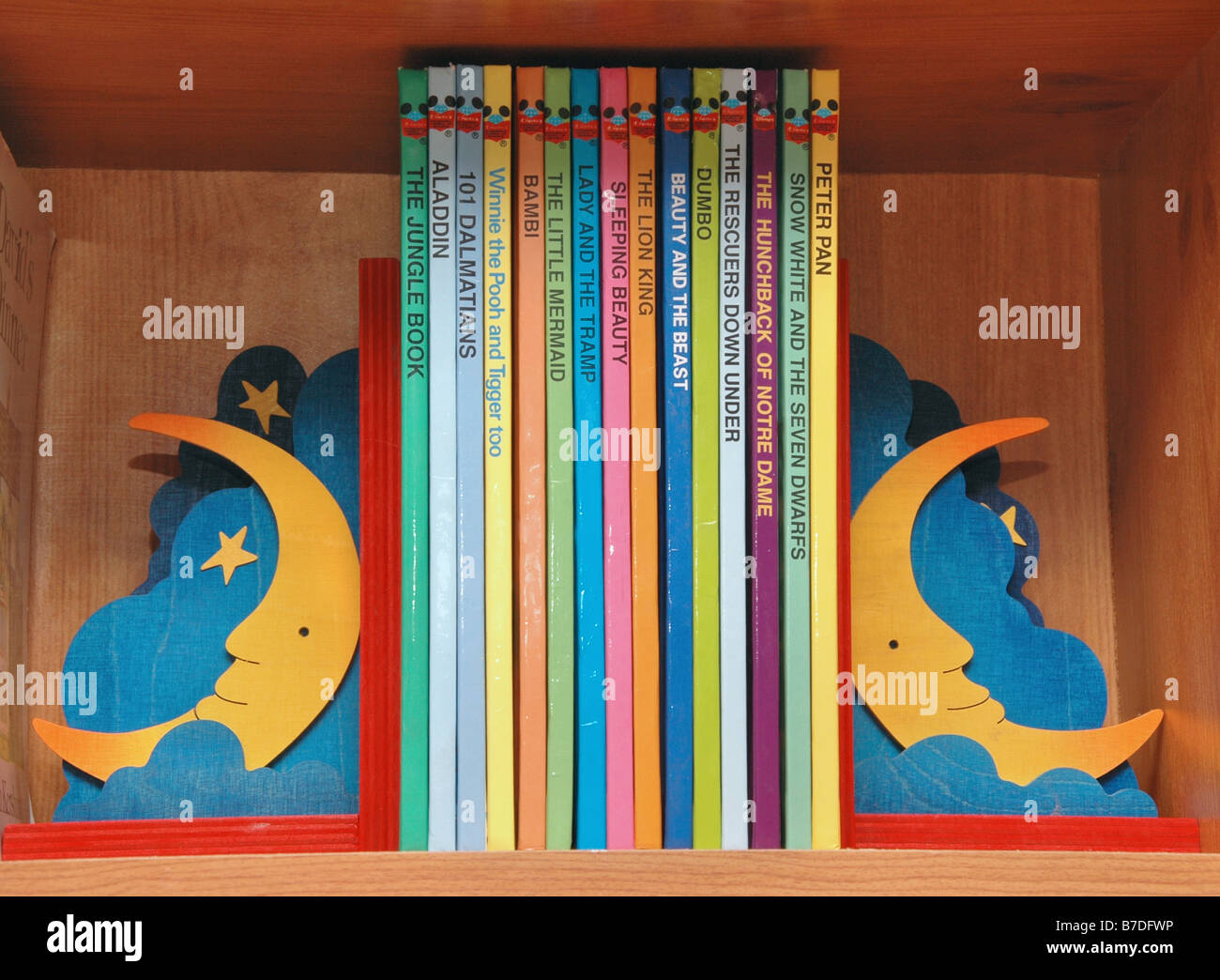 a selection of a young child's books with moon bookends Stock Photo - Alamy