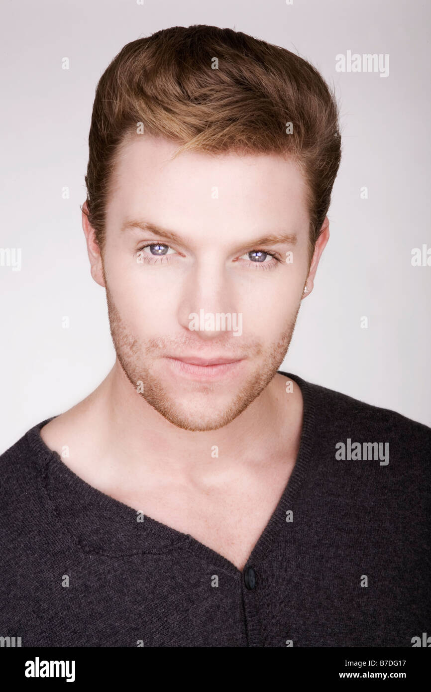 handsome man looking into camera Stock Photo - Alamy