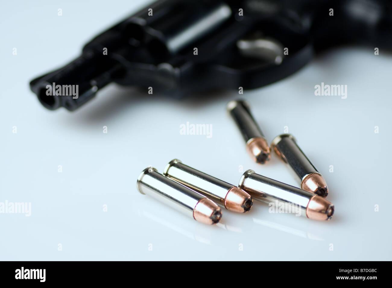 Black Revolver and Bullets Stock Photo - Alamy