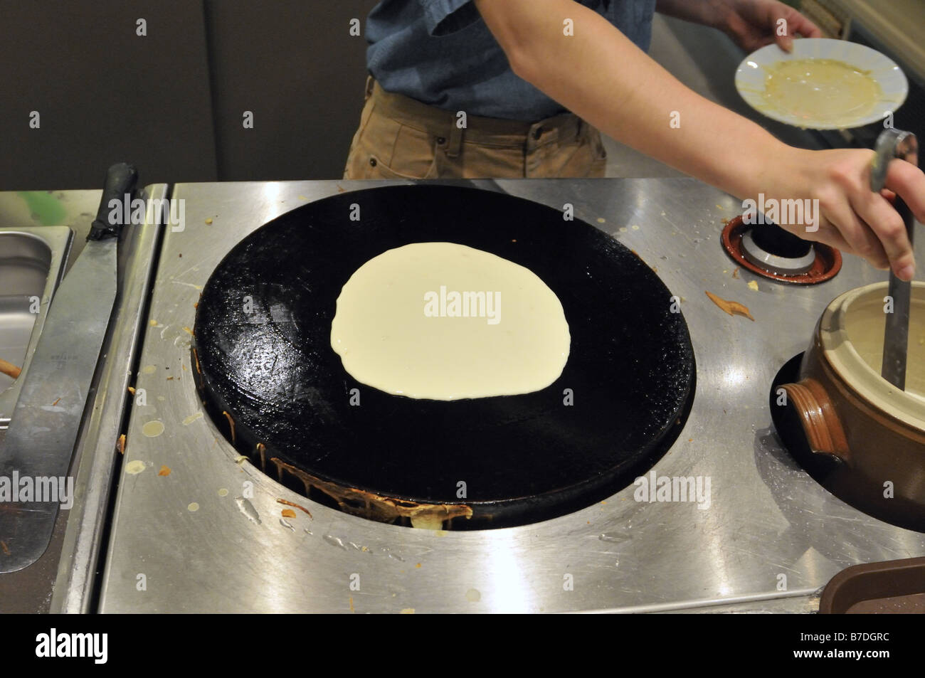 Making French crepe sequence 1 of 4 Stock Photo - Alamy