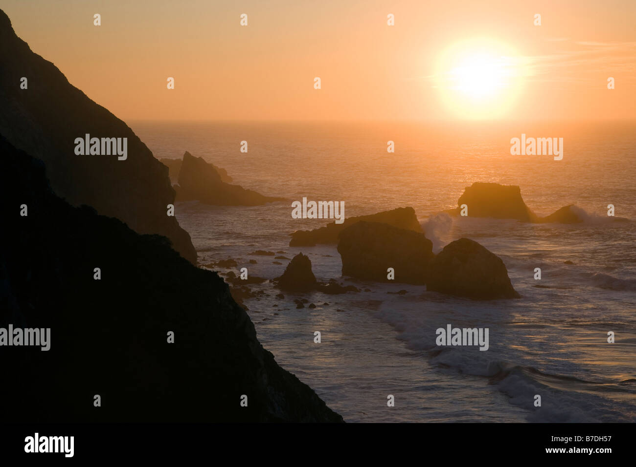 Rocky ocean coast at the sunset hi-res stock photography and images - Alamy