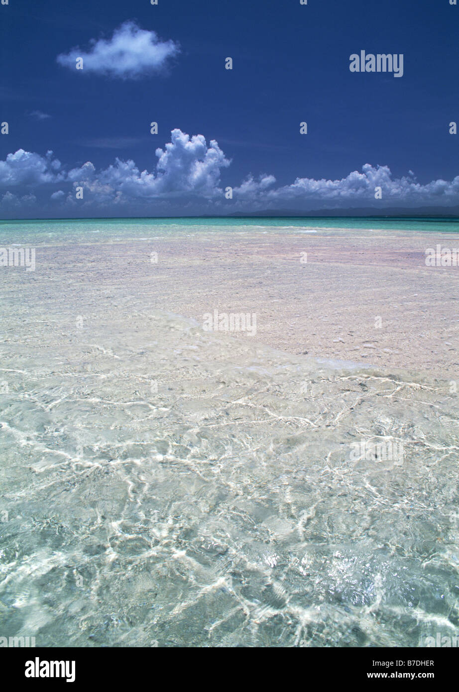Shallow beach and sky Stock Photo - Alamy