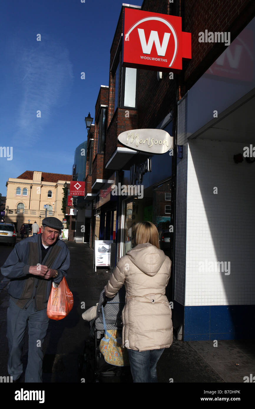 a street scene with Woolworth's the famous high street shop that went ...