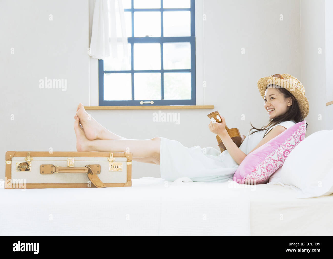 Woman leg raise bed hi-res stock photography and images - Alamy