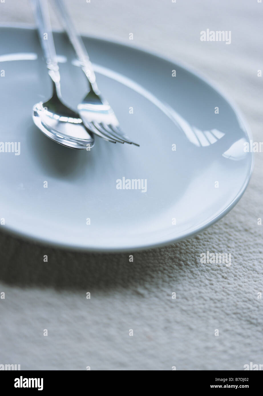 Plate and cutleries Stock Photo - Alamy