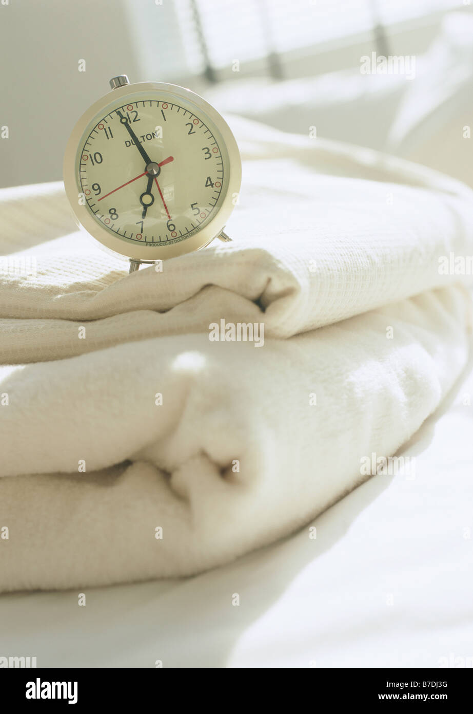Alarm clock on fabric hi-res stock photography and images - Alamy