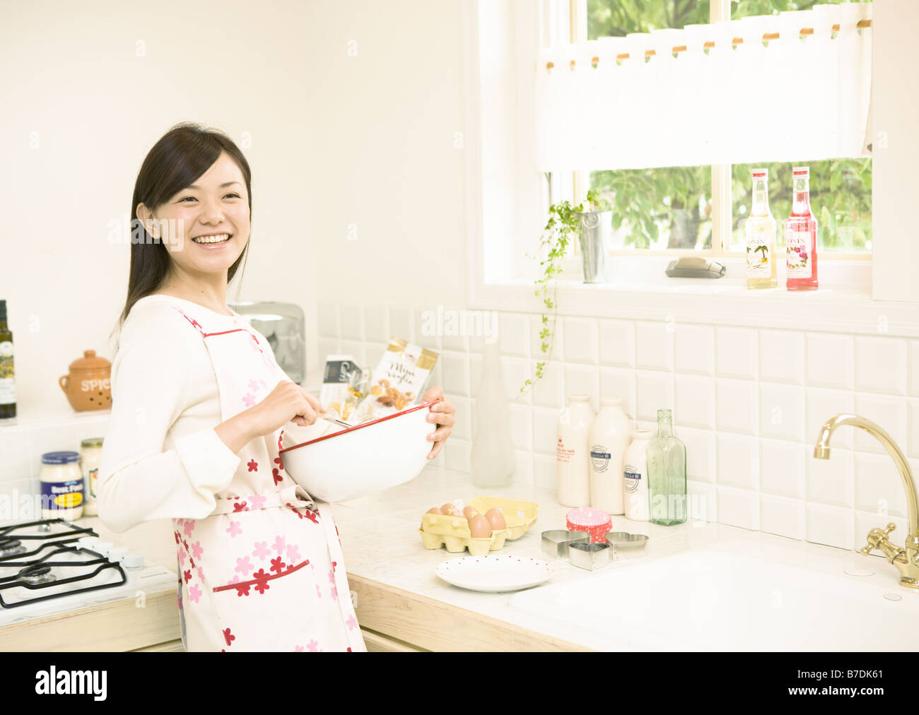 A woman making sweets Stock Photo - Alamy