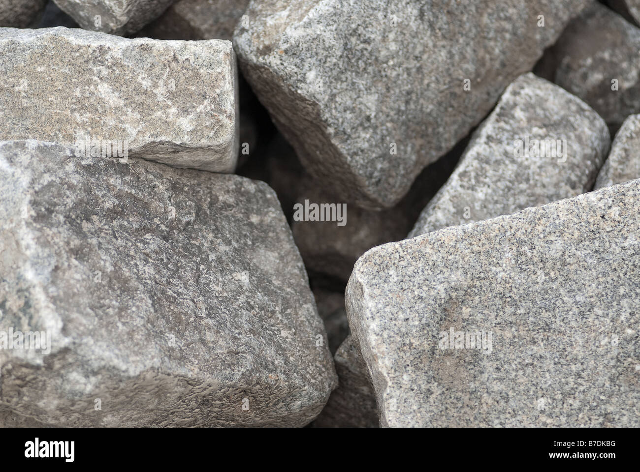 a bunch of cobblestones at a building site Stock Photo - Alamy
