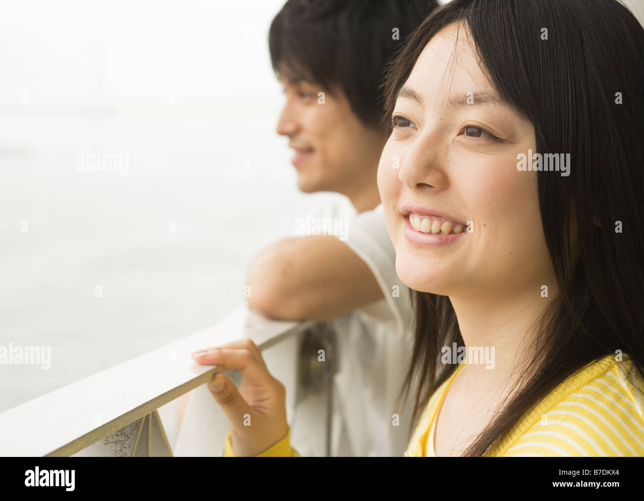 Smiling girl and man Stock Photo - Alamy
