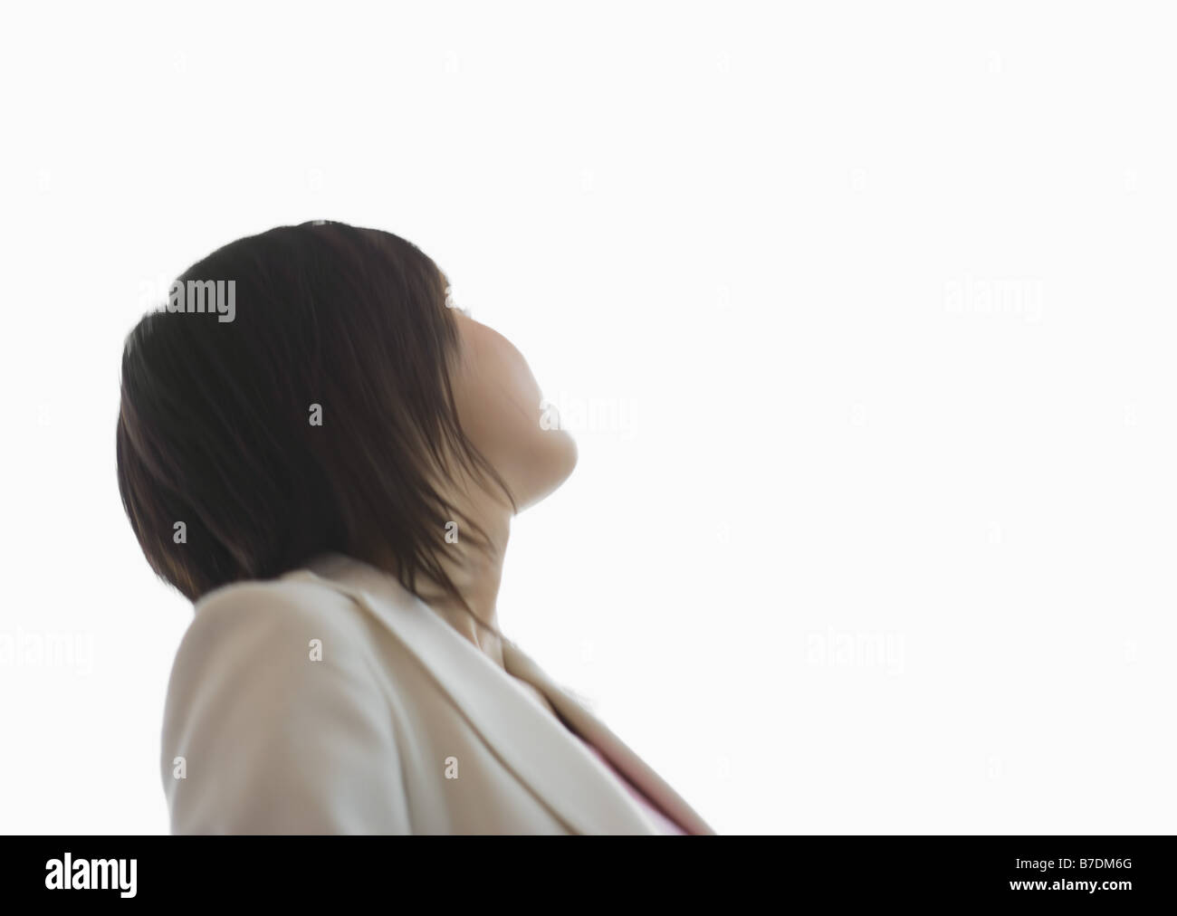 Young woman looking up Stock Photo - Alamy