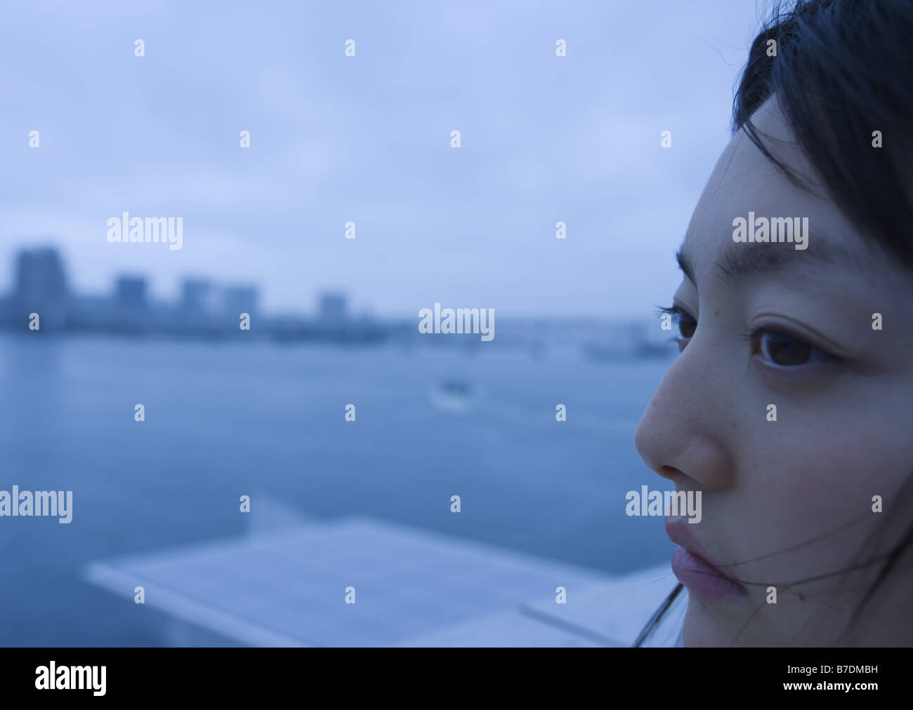 Young woman looking away on ship Stock Photo - Alamy