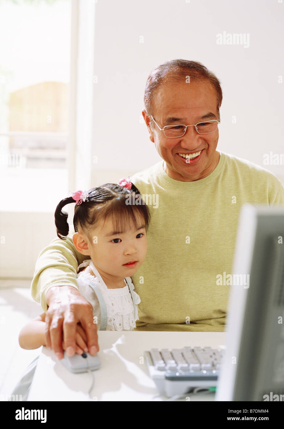Back view girl desktop hi-res stock photography and images - Alamy