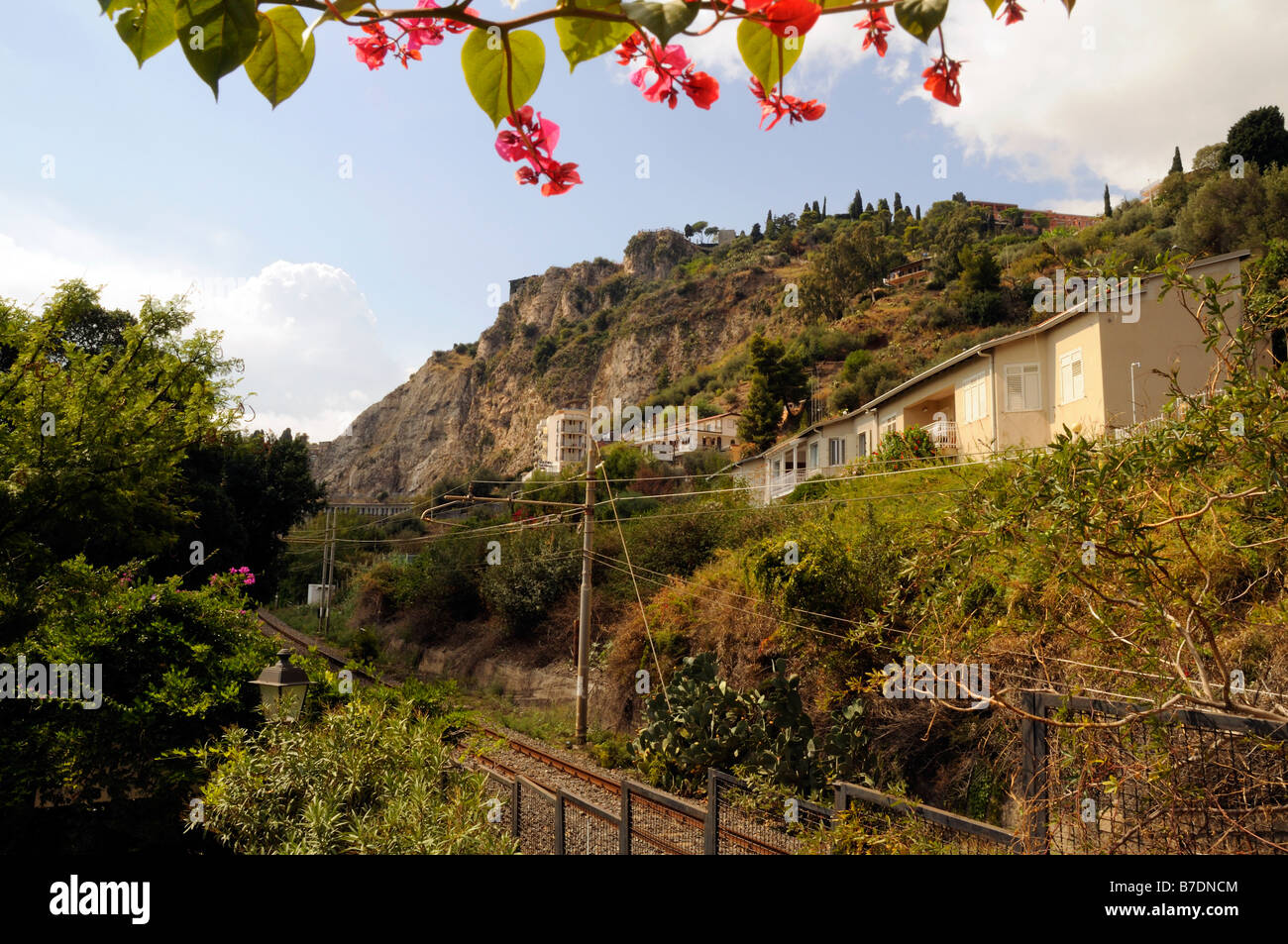 Train tracks at Taormina Mare or Mazzaro with Isola Bella and beach ...
