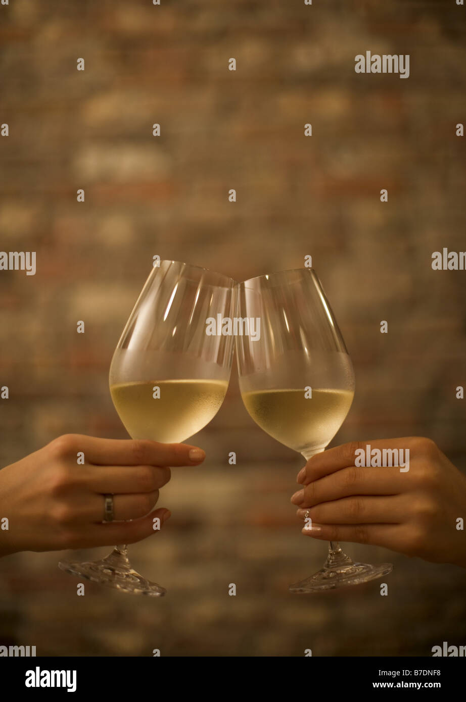 White wine toast Stock Photo - Alamy