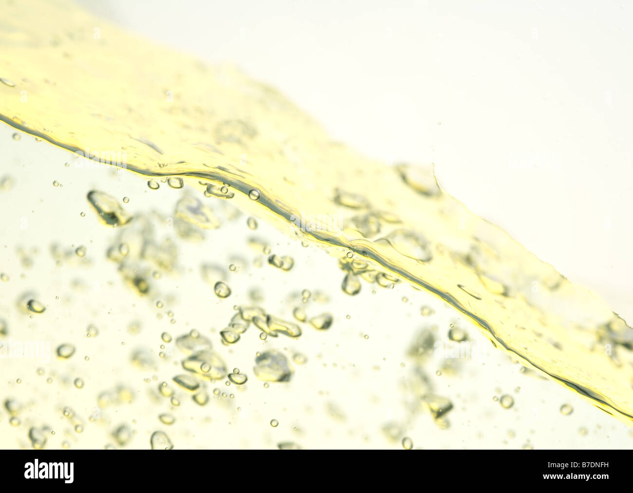 Wave motion and water bubbles Stock Photo - Alamy