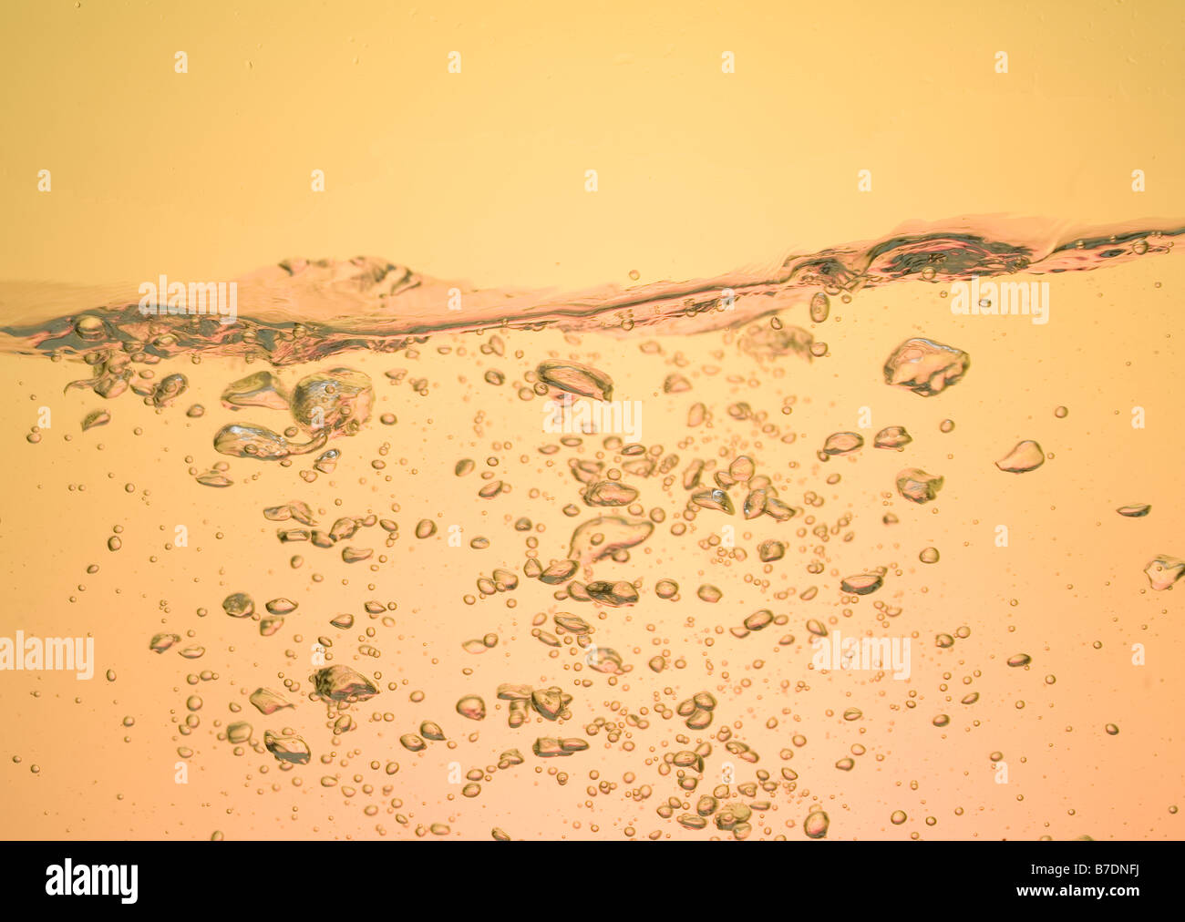 Wave motion and water bubbles Stock Photo - Alamy