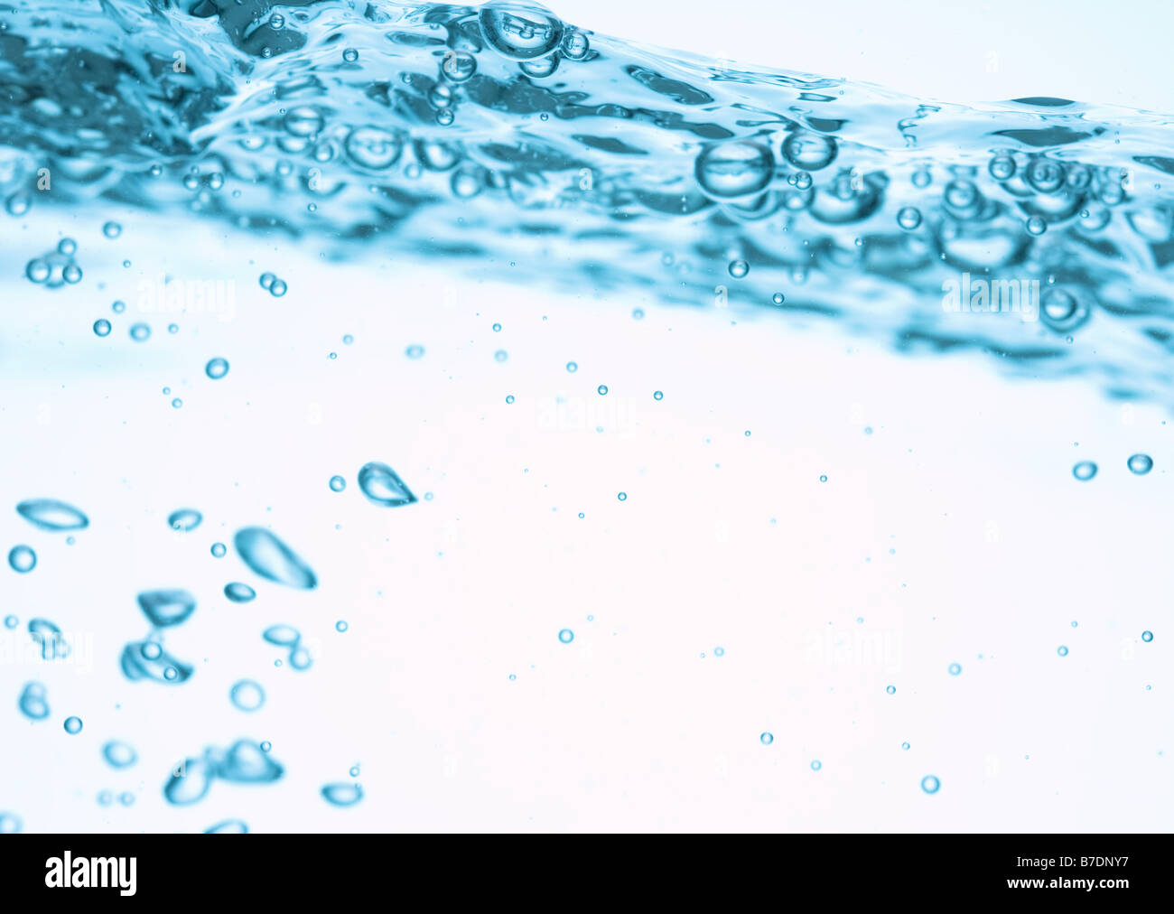 Wave motion and water bubbles Stock Photo - Alamy