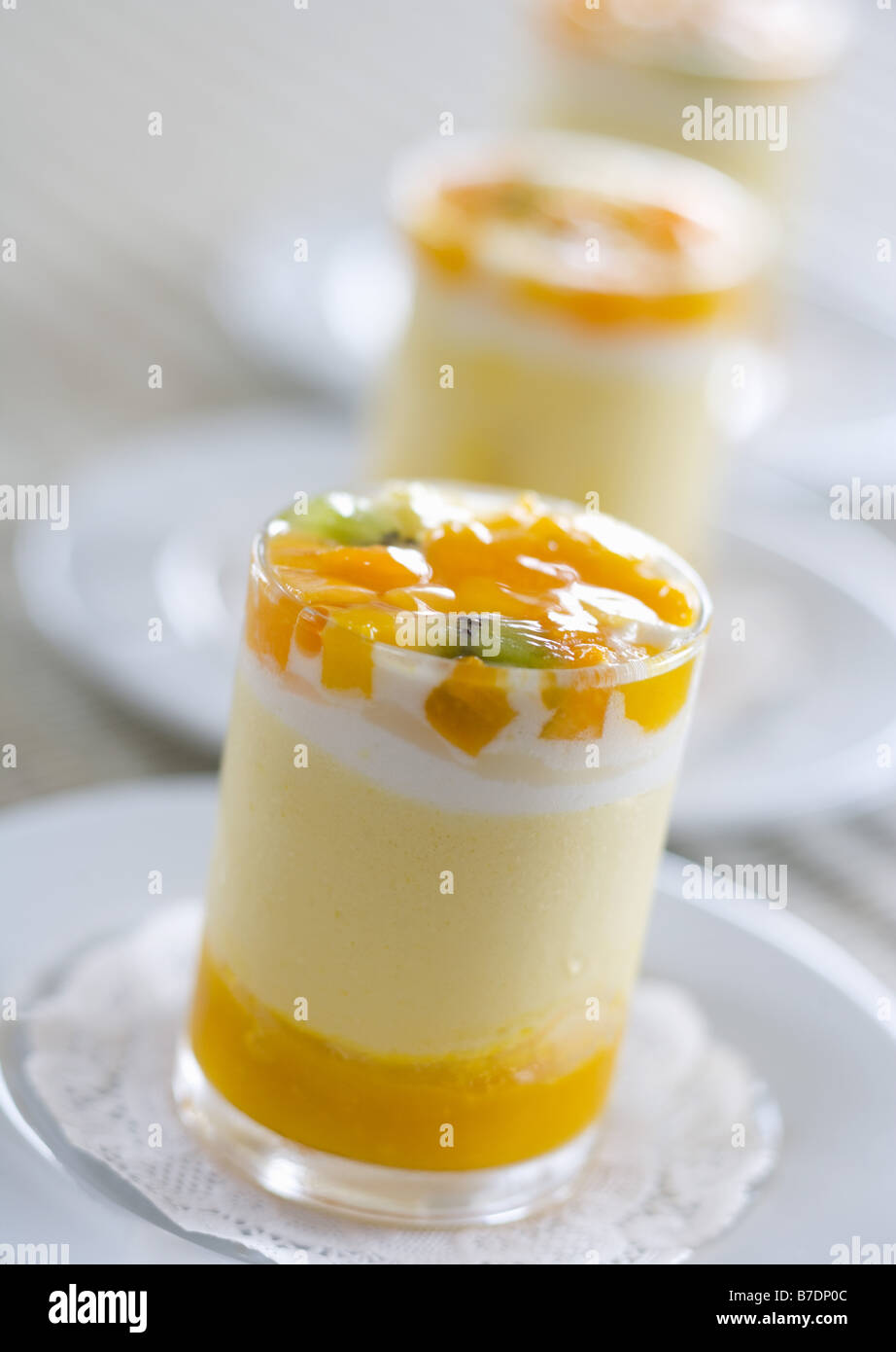 Layered dessert with mango and coconut Stock Photo - Alamy