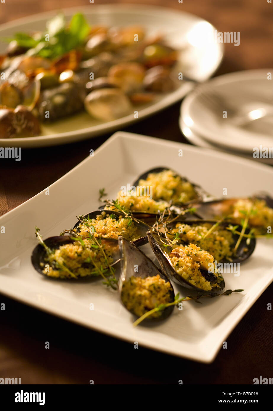 Oven roasted mussels Stock Photo - Alamy
