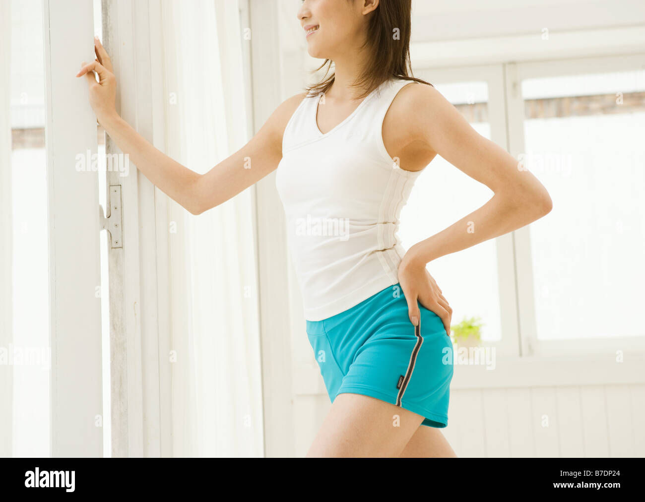 Woman stretching out Stock Photo - Alamy