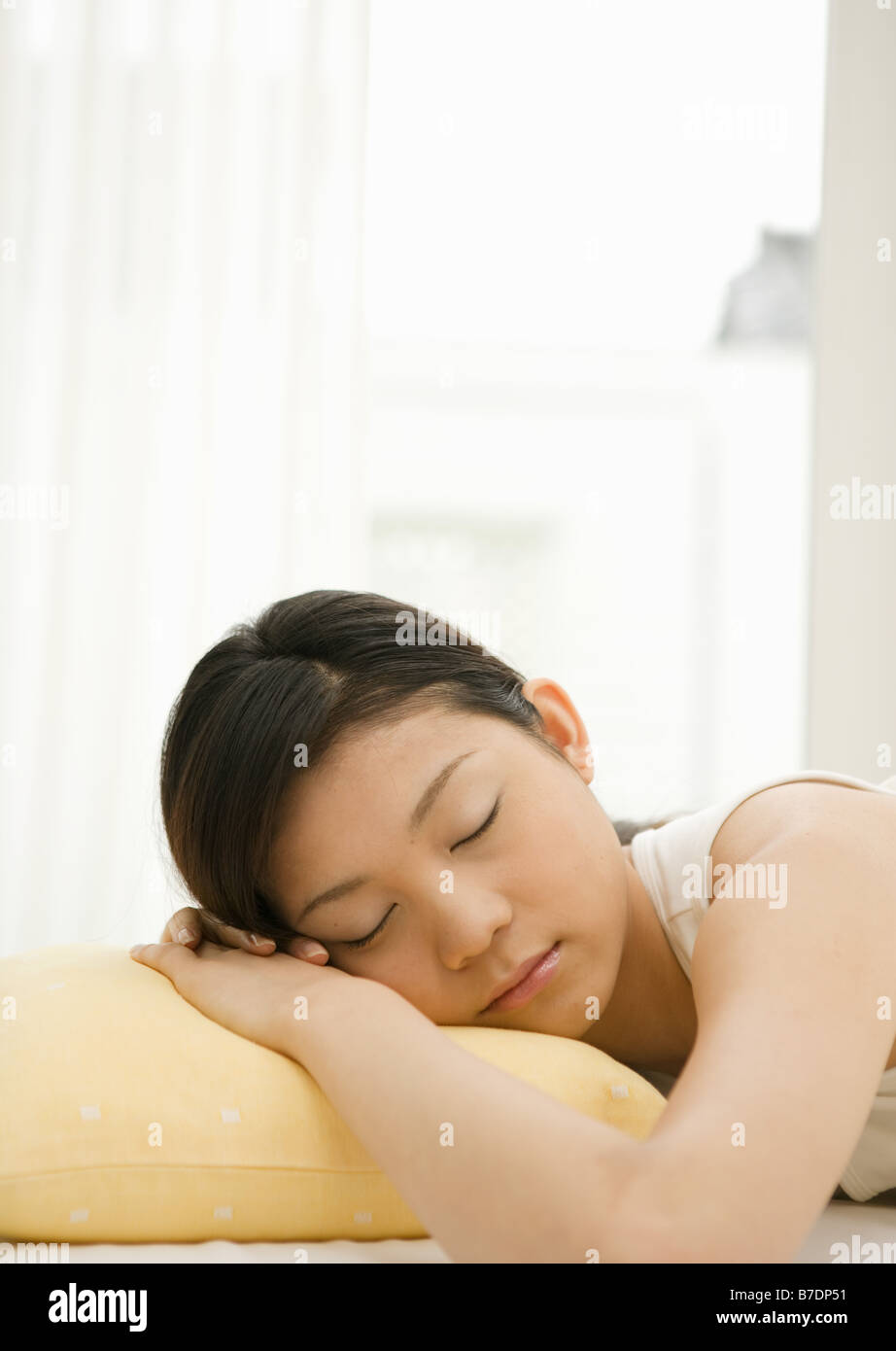 Woman taking a nap Stock Photo - Alamy