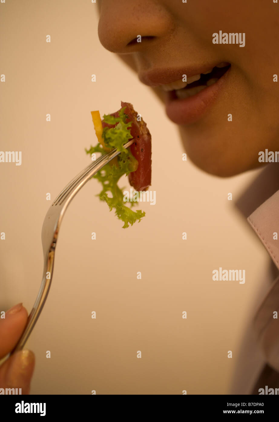 Close up woman eating tuna hi-res stock photography and images - Alamy