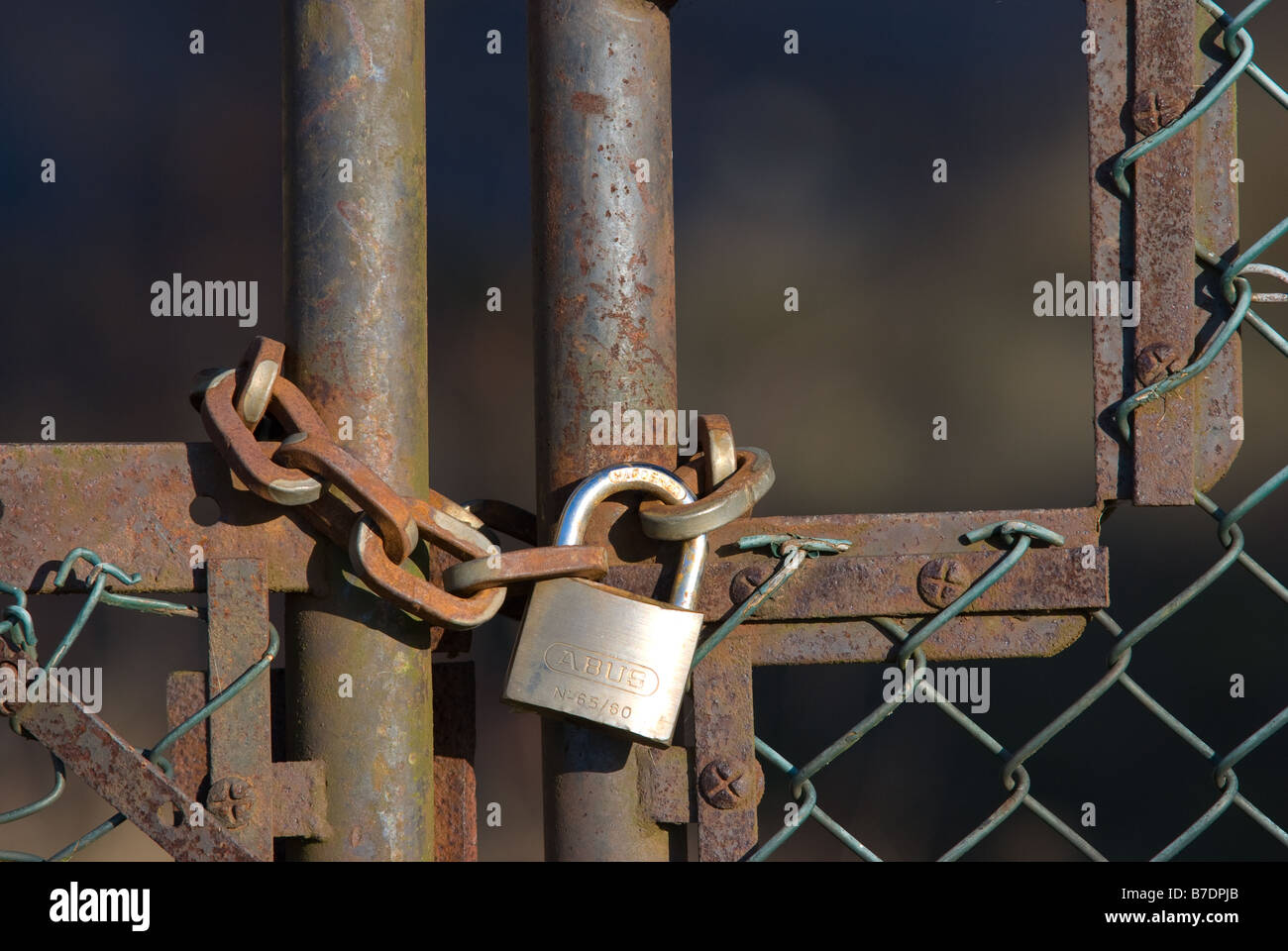 Locked gates baring entry to an old coal mining site Stock Photo - Alamy