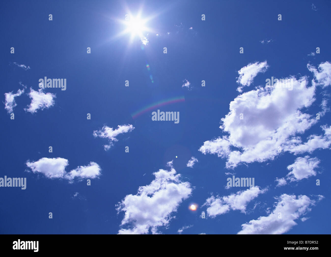 Blue sky and Sunshine Stock Photo - Alamy
