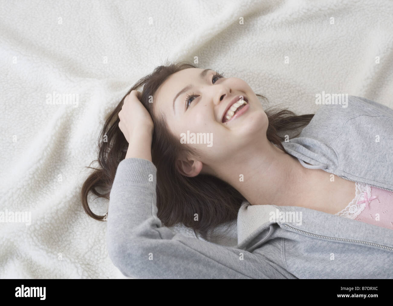 Medium shot woman lying on hi-res stock photography and images - Alamy