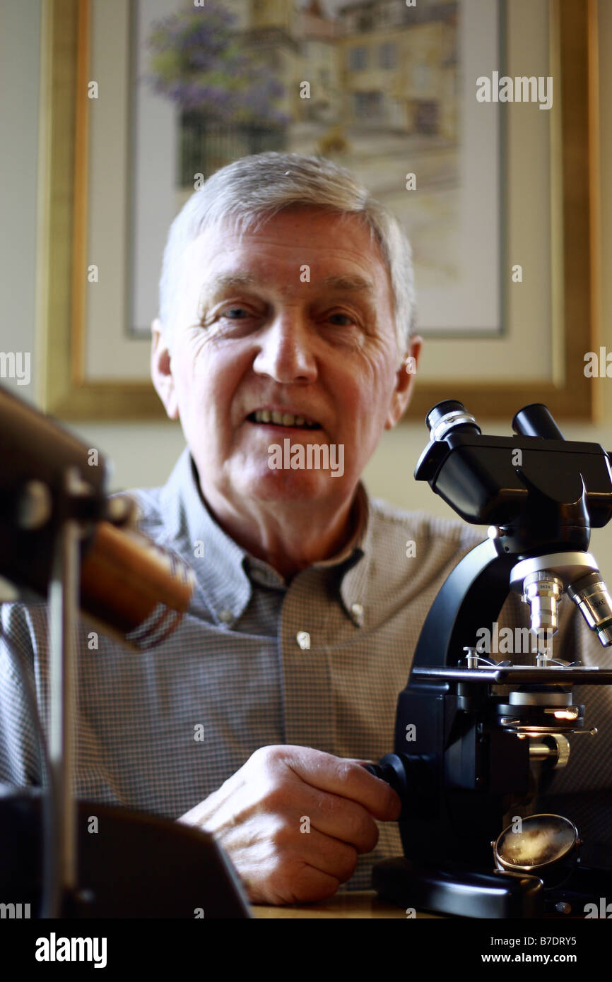 Microscope happy man portrait hi-res stock photography and images - Alamy