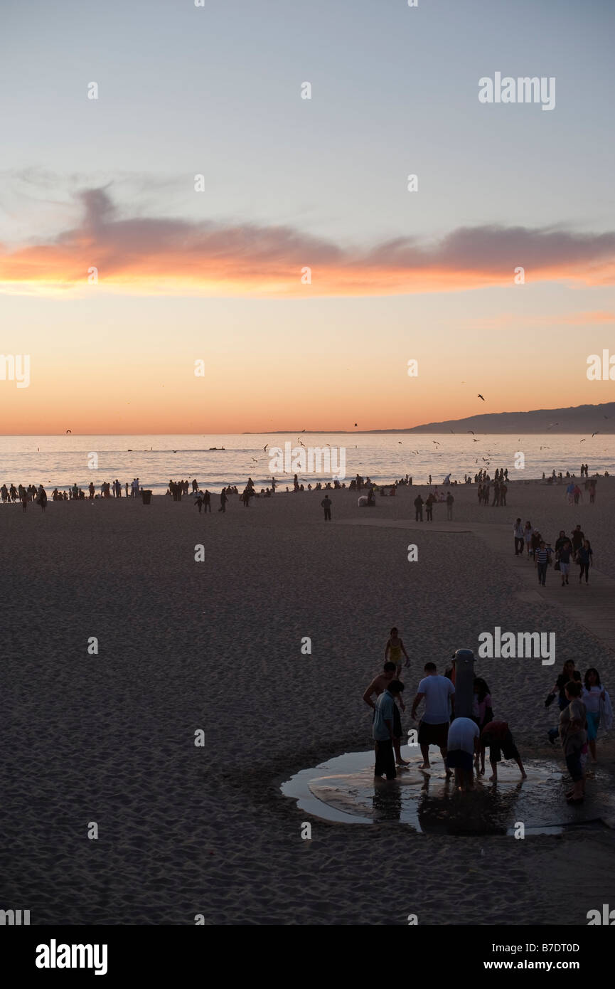 People at the beach at the Santa Monica Pier in southern California ...