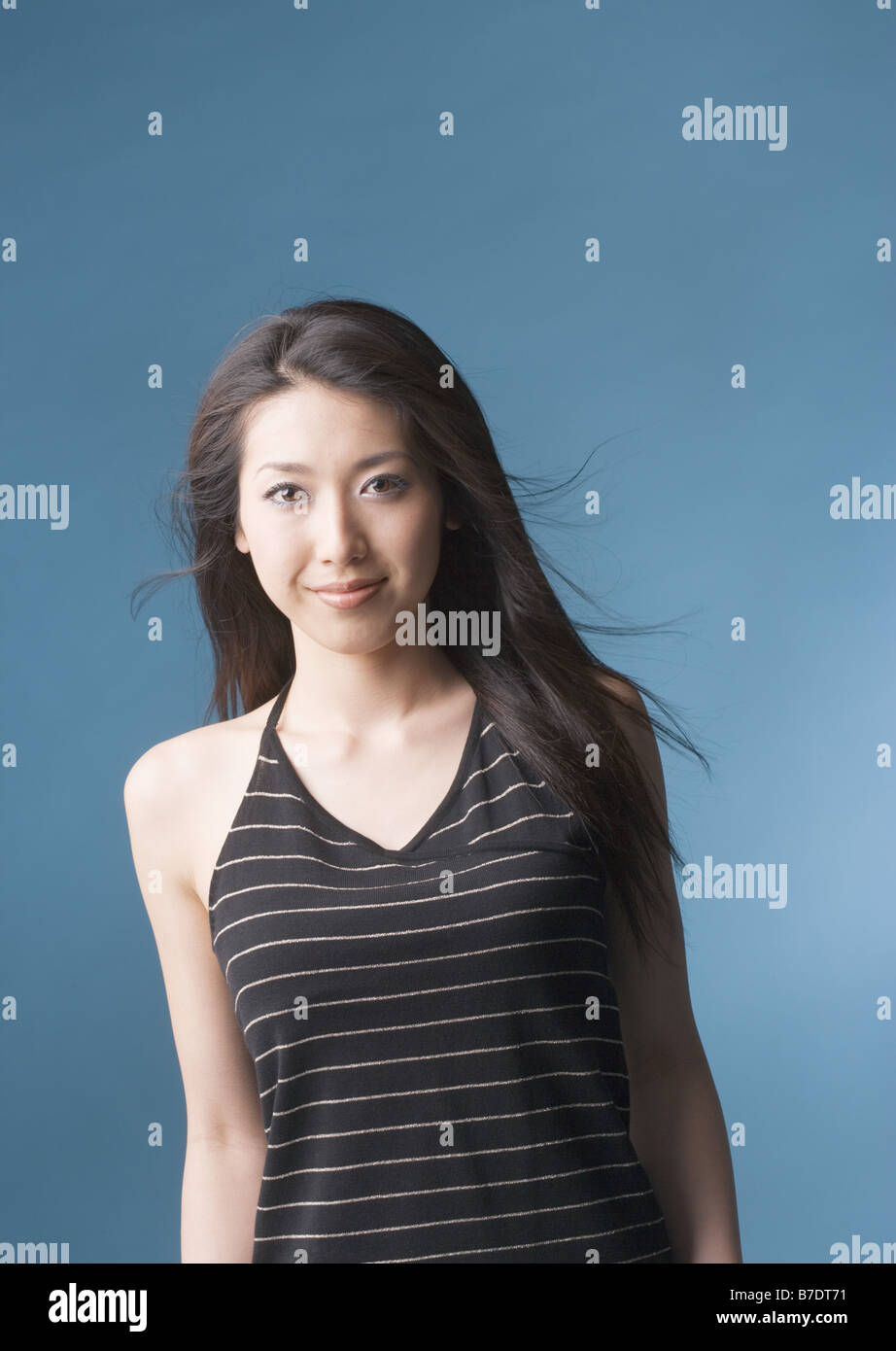 Woman smiling with long hair Stock Photo - Alamy