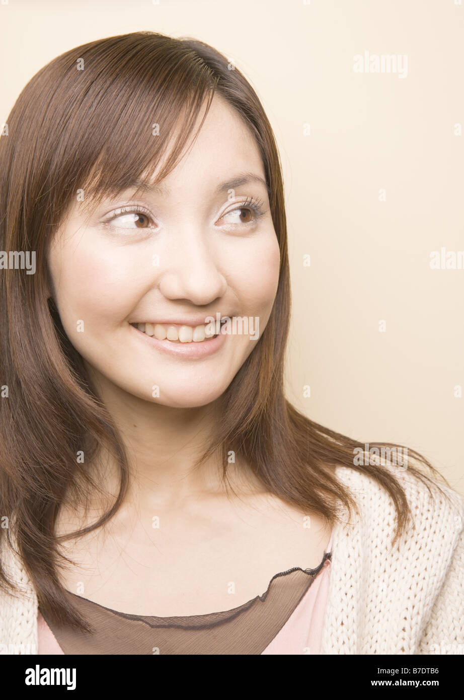 Woman smiling with long hair Stock Photo - Alamy