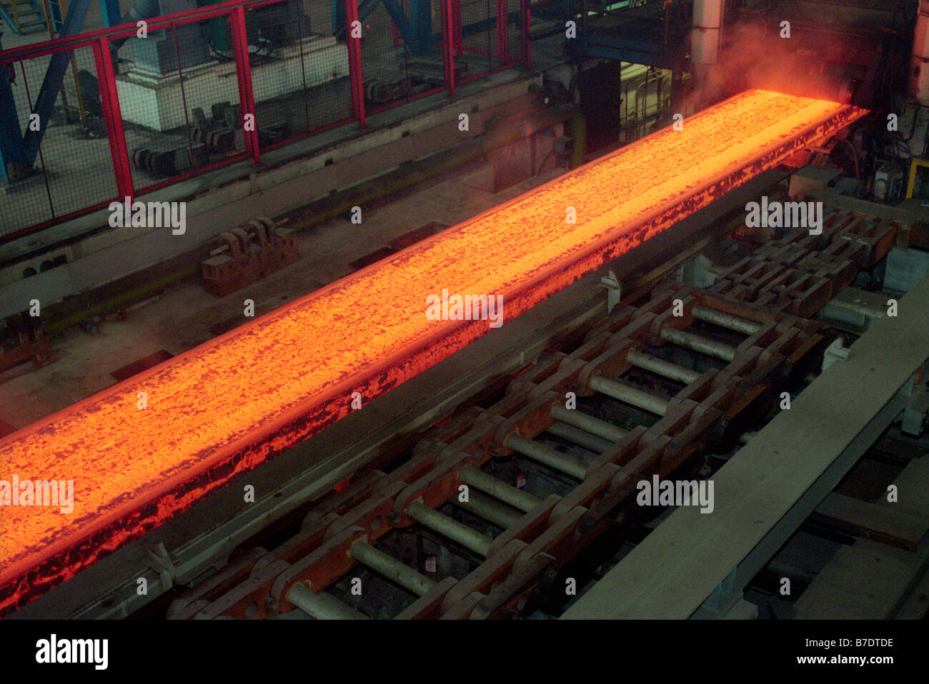 Steel slab being rolled on the Hot strip mill at Corus Llanwern ...