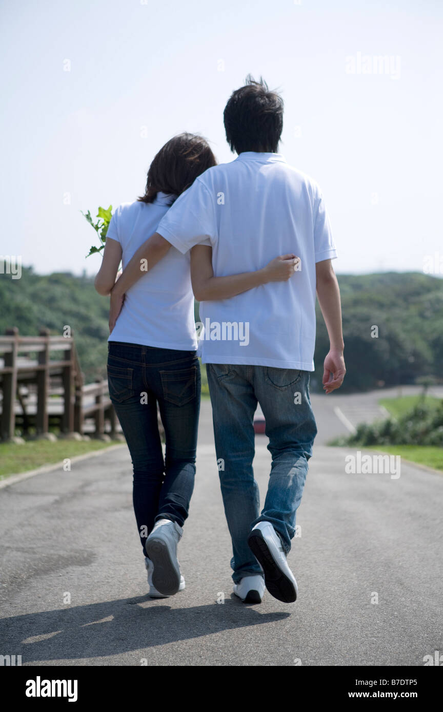 Hip couple rear view hi-res stock photography and images - Alamy